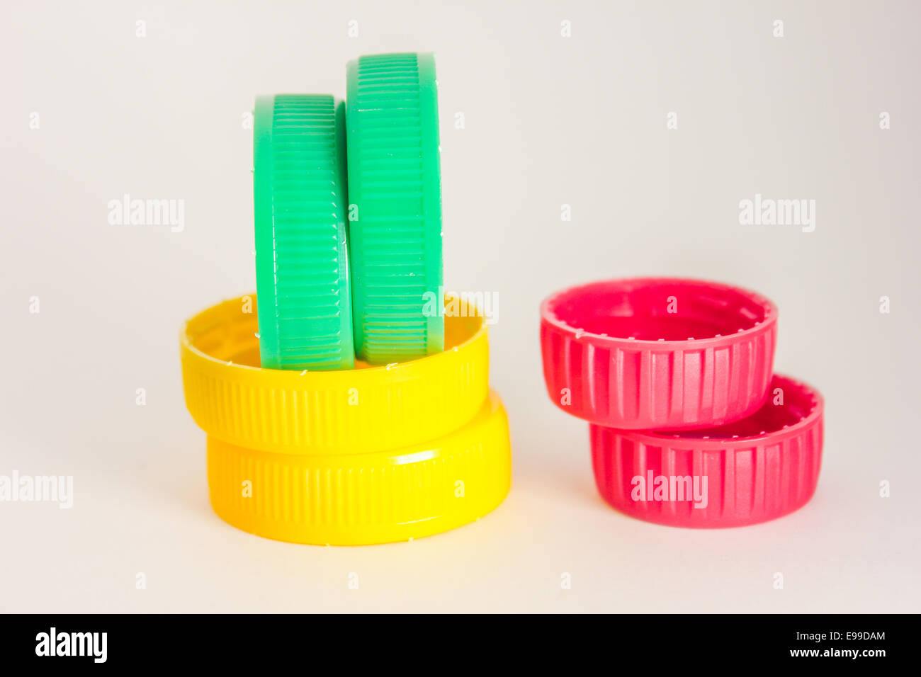 Stock Photo - Colorful plastic caps isolated in white Stock Photo - Alamy