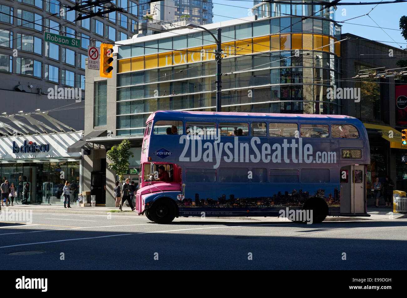 Double-decker sightseeing bus in downtown Vancouver, BC, Canada Stock ...