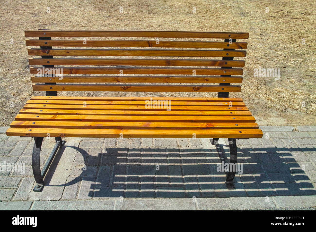 Wooden bench and the shadow in outside Stock Photo - Alamy