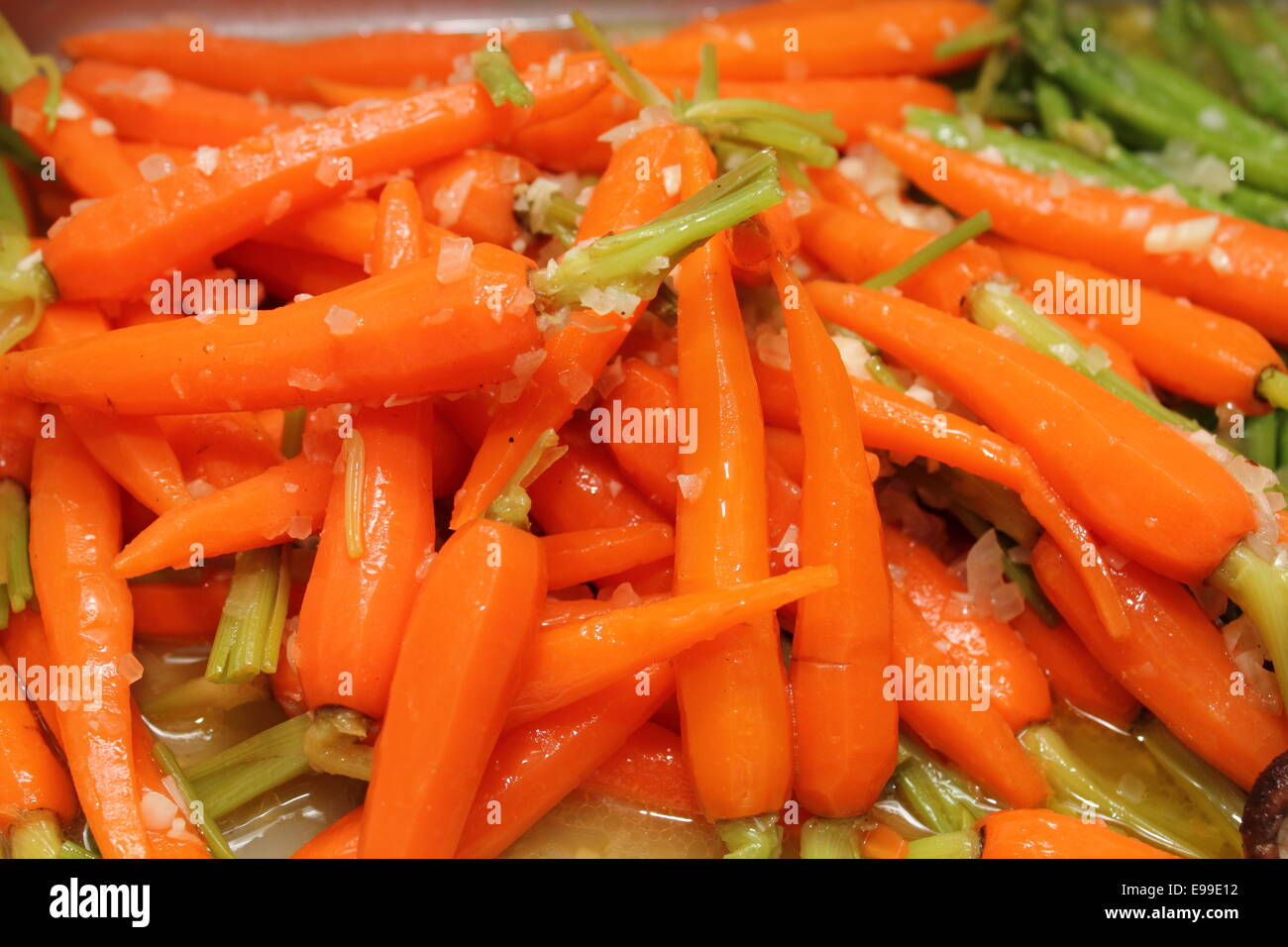 A fresh baby carrot for background uses Stock Photo - Alamy