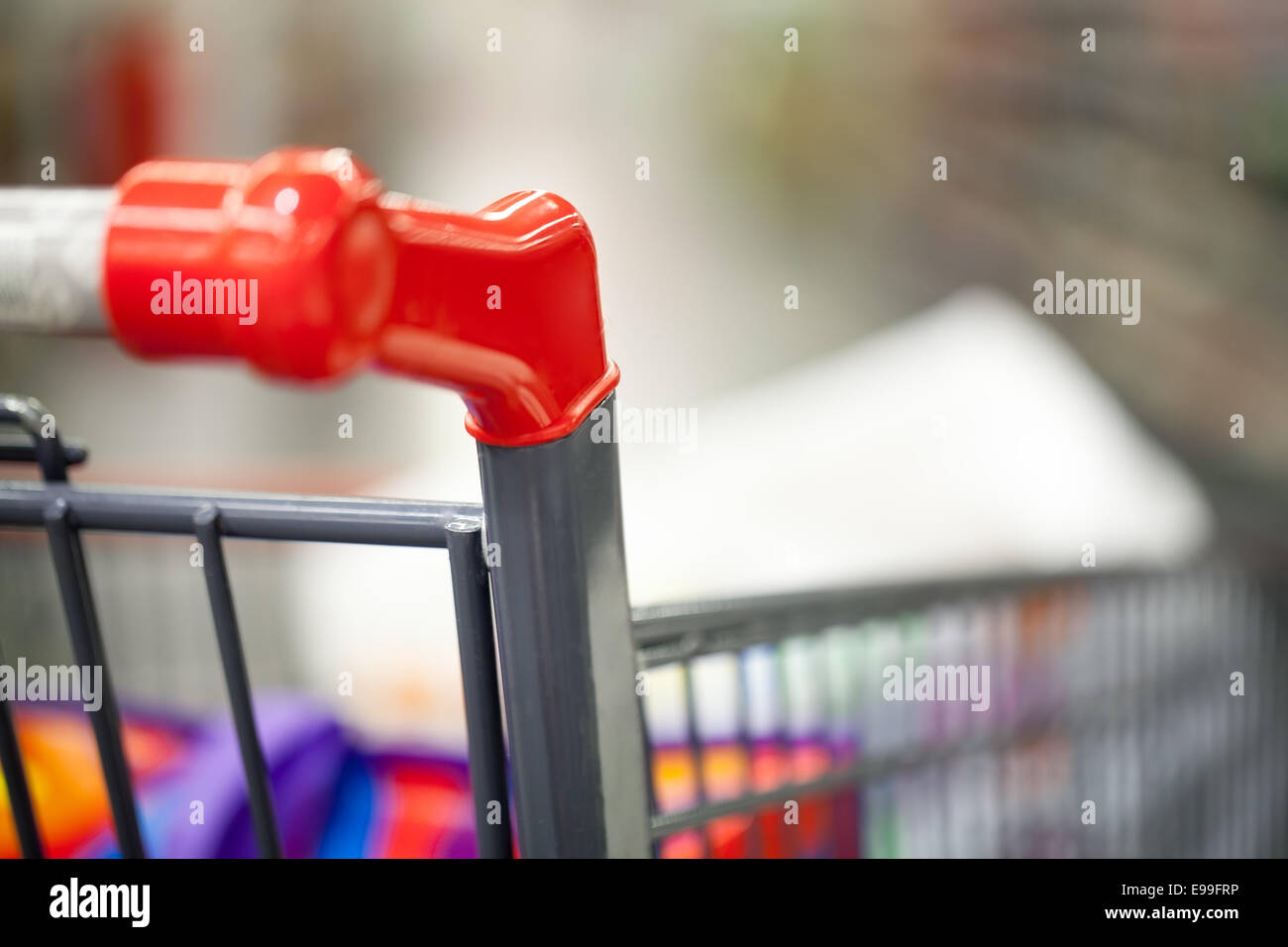 Shopping cart with goods Stock Photo - Alamy