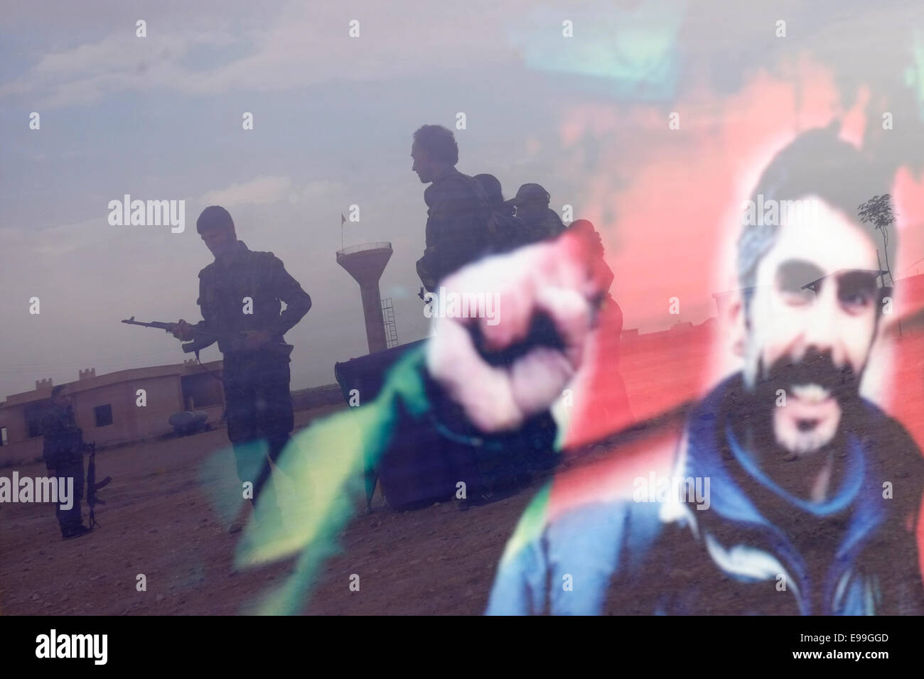 Kurdish People's Protection Unit YPG fighters reflected in a glassed ...
