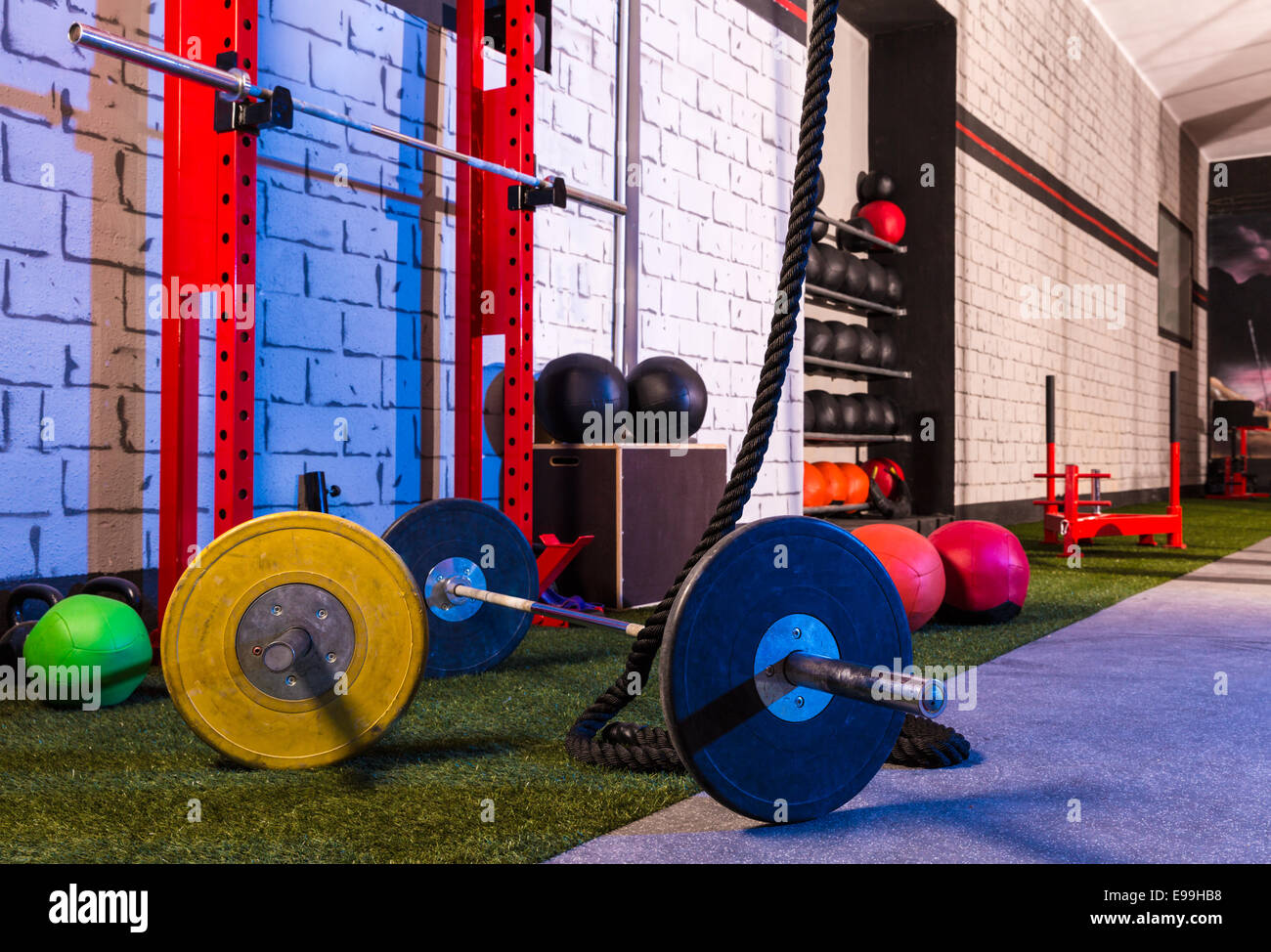 Barbells in a gym bar bells and rope at cross fit Stock Photo - Alamy