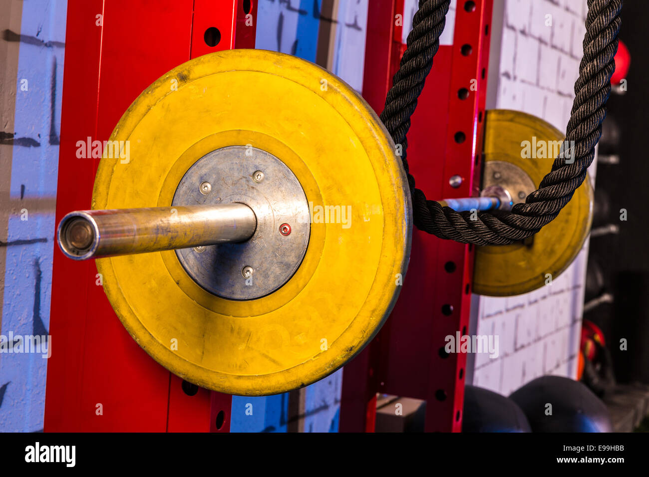 Barbells in a gym bar bells and rope at cross fit Stock Photo - Alamy