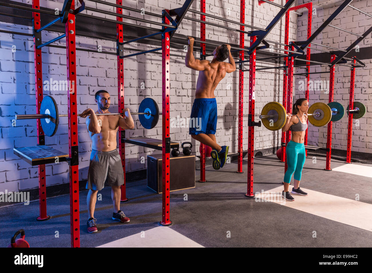 Barbell weight lifting group weightlifting workout exercise gym Stock ...