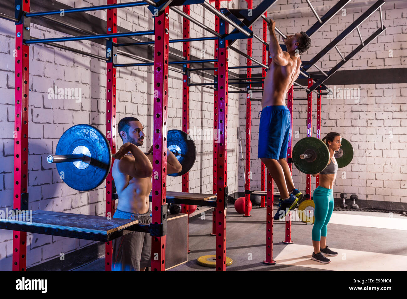 Barbell weight lifting group weightlifting workout exercise gym Stock ...