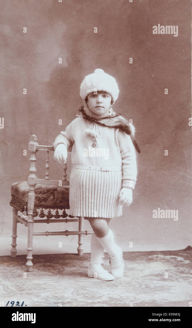 Old portrait of a girl. Made in a studio. Vintage Stock Photo - Alamy