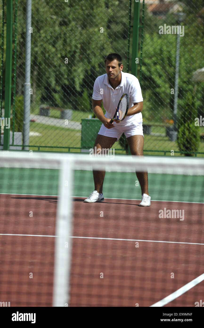 young man play tennis Stock Photo - Alamy