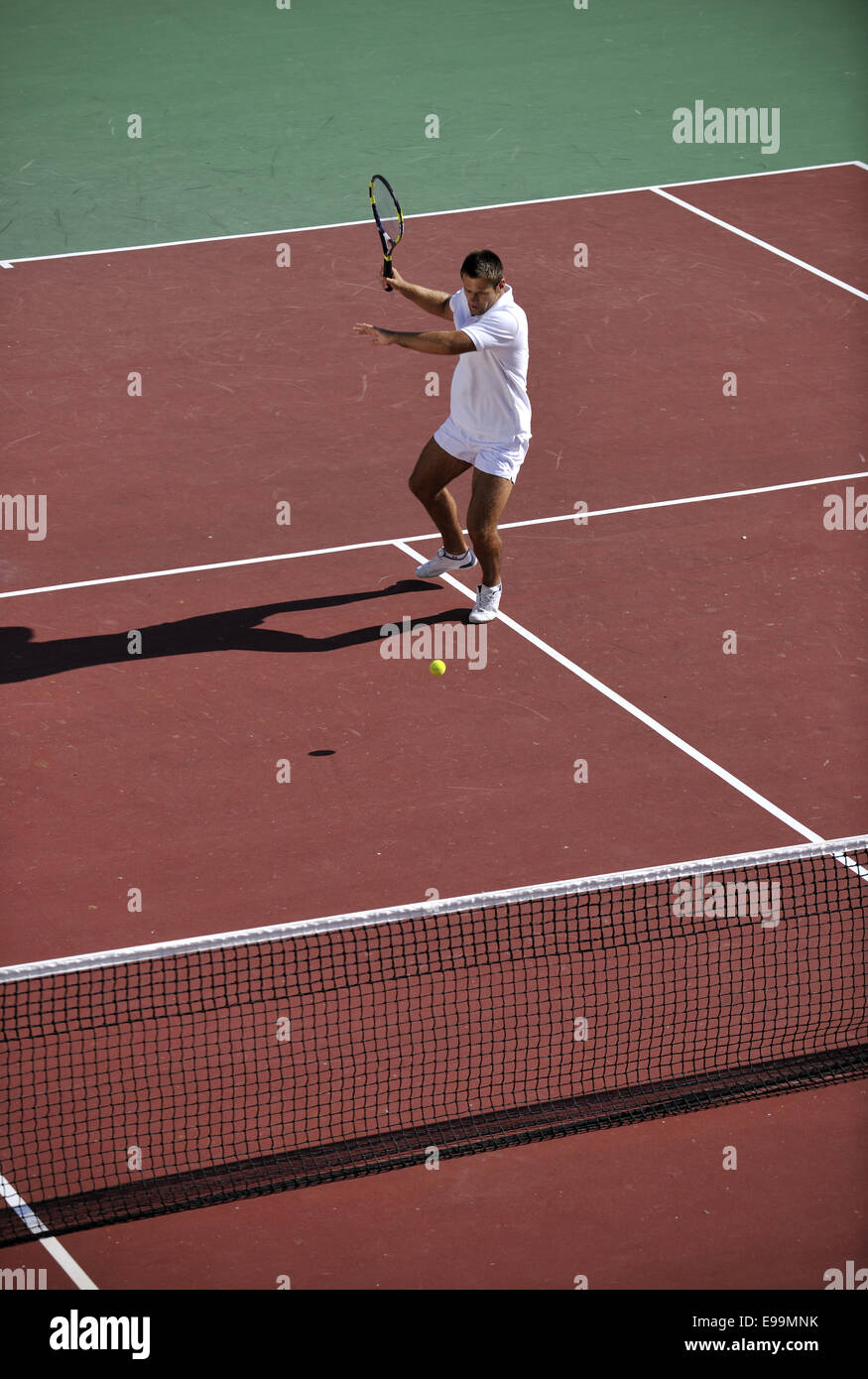 young man play tennis Stock Photo - Alamy