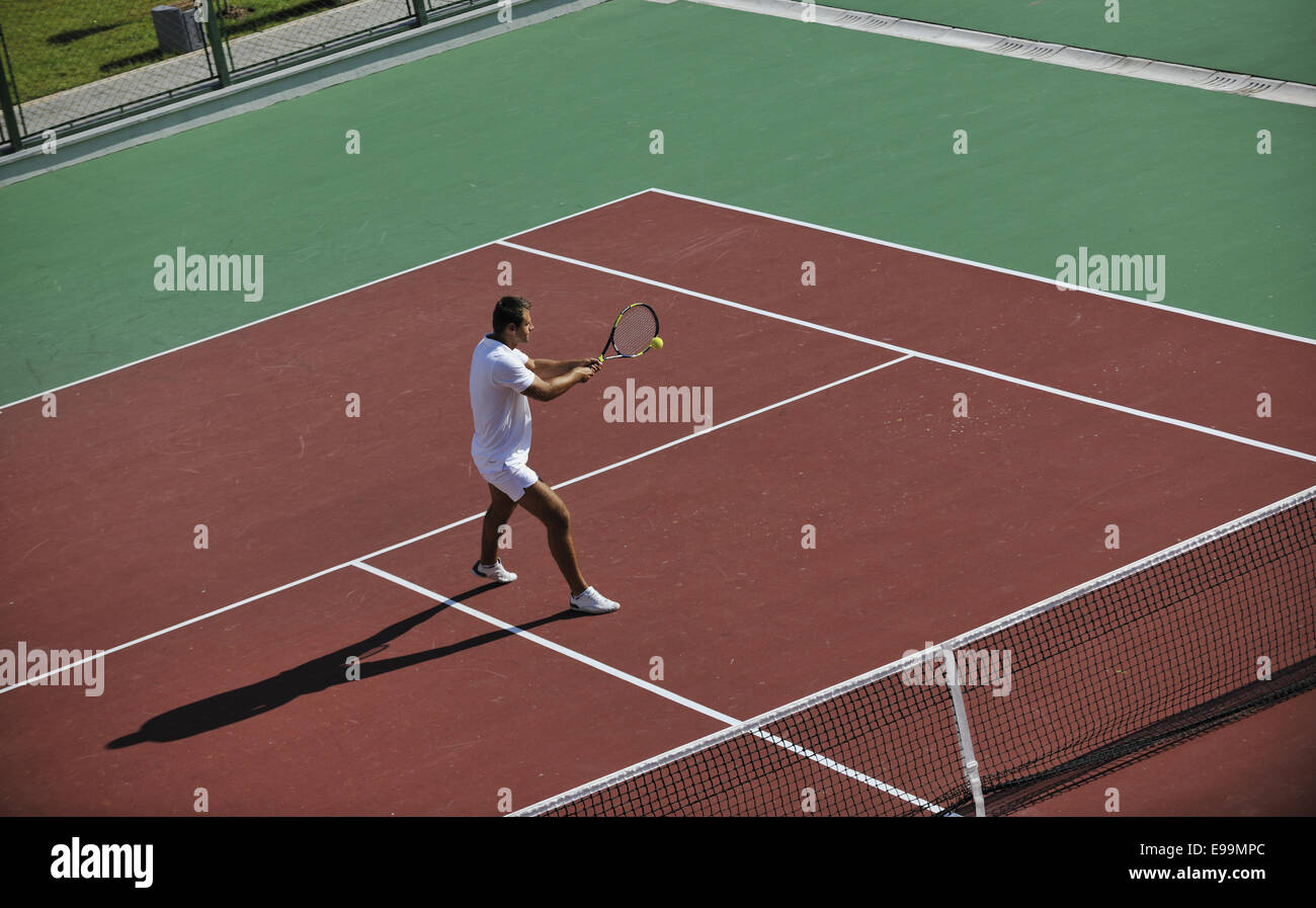 young man play tennis Stock Photo - Alamy