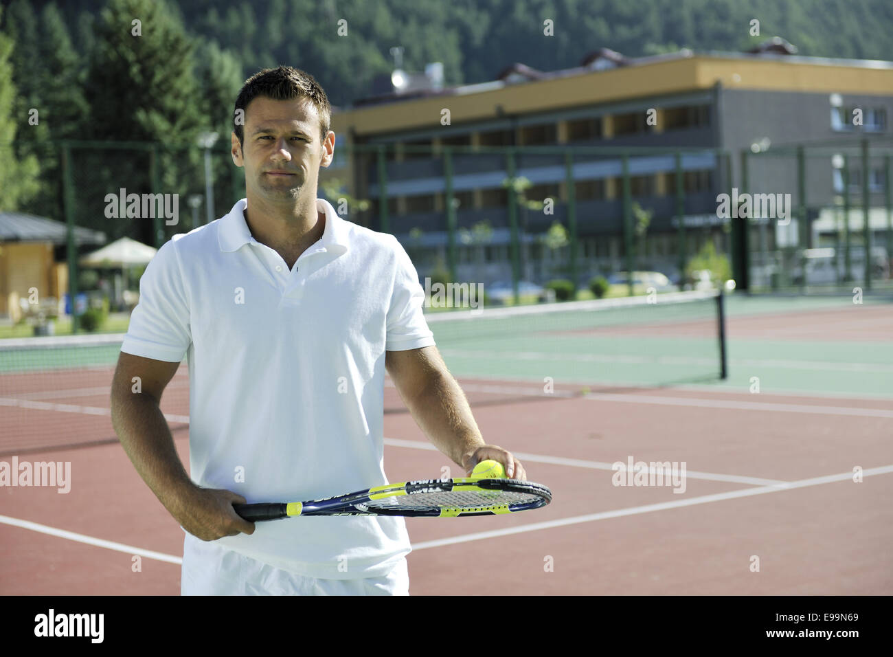 young man play tennis Stock Photo - Alamy