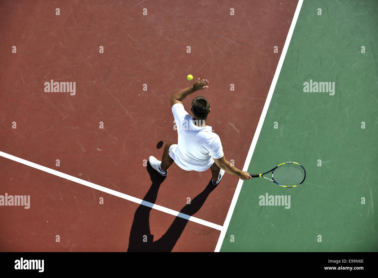 young man play tennis Stock Photo - Alamy
