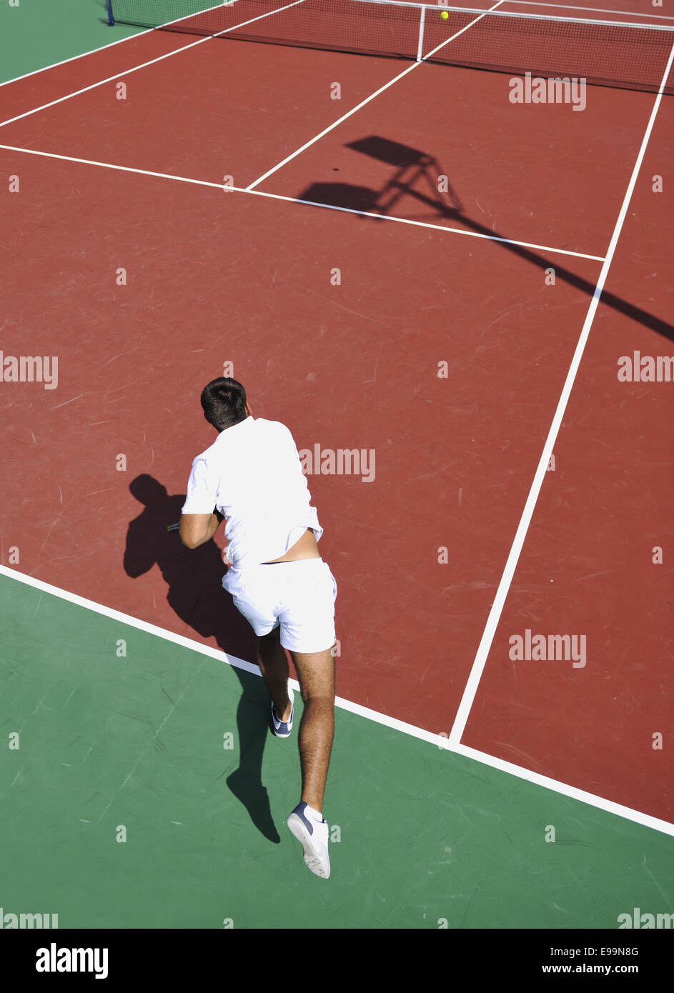 young man play tennis outdoor Stock Photo - Alamy