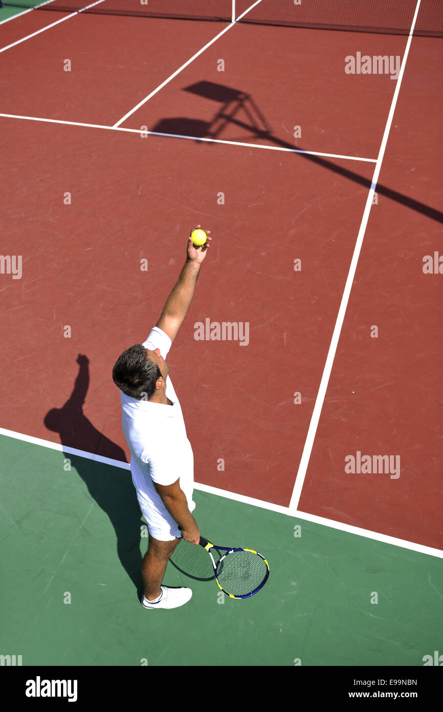 young man play tennis outdoor Stock Photo - Alamy
