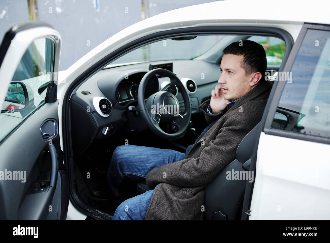 man using car navigation Stock Photo - Alamy