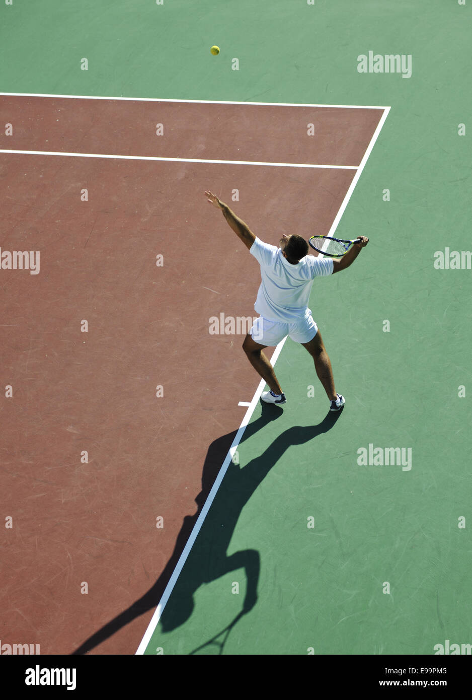 young man play tennis Stock Photo - Alamy