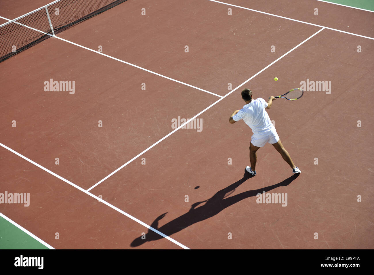 young man play tennis Stock Photo - Alamy