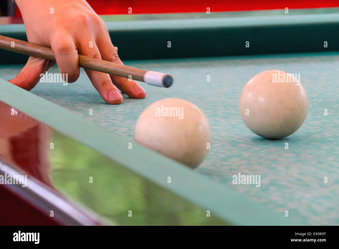 Hand with cue before the a blow to the billiard ball Stock Photo - Alamy