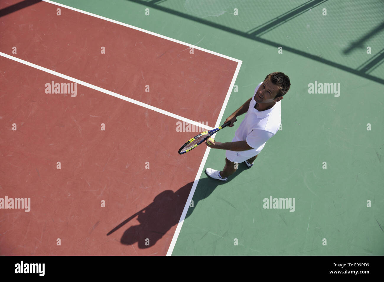 young man play tennis outdoor Stock Photo - Alamy