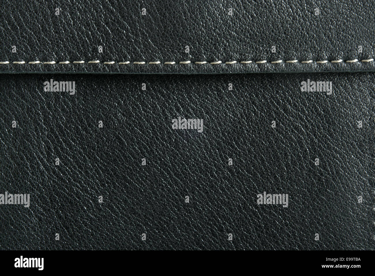 Natural black leather background Stock Photo - Alamy