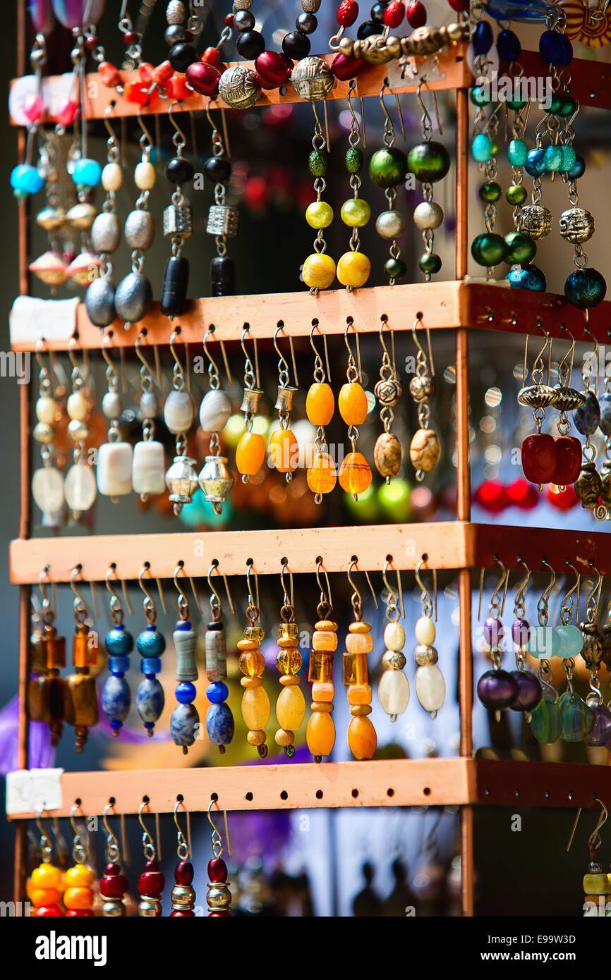 Different types of beautiful colored earrings Stock Photo - Alamy