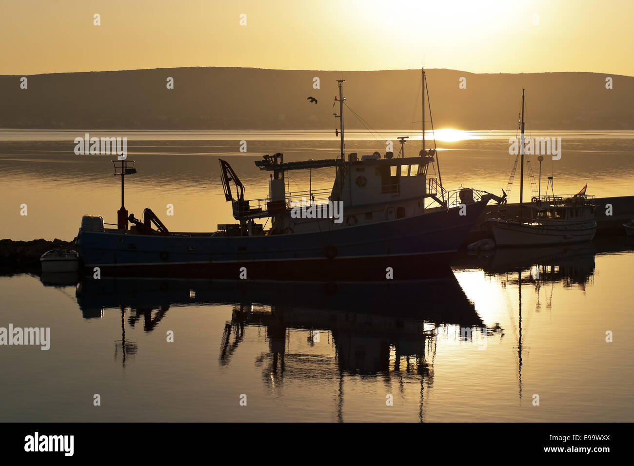 Sunrise at the harbour Stock Photo - Alamy