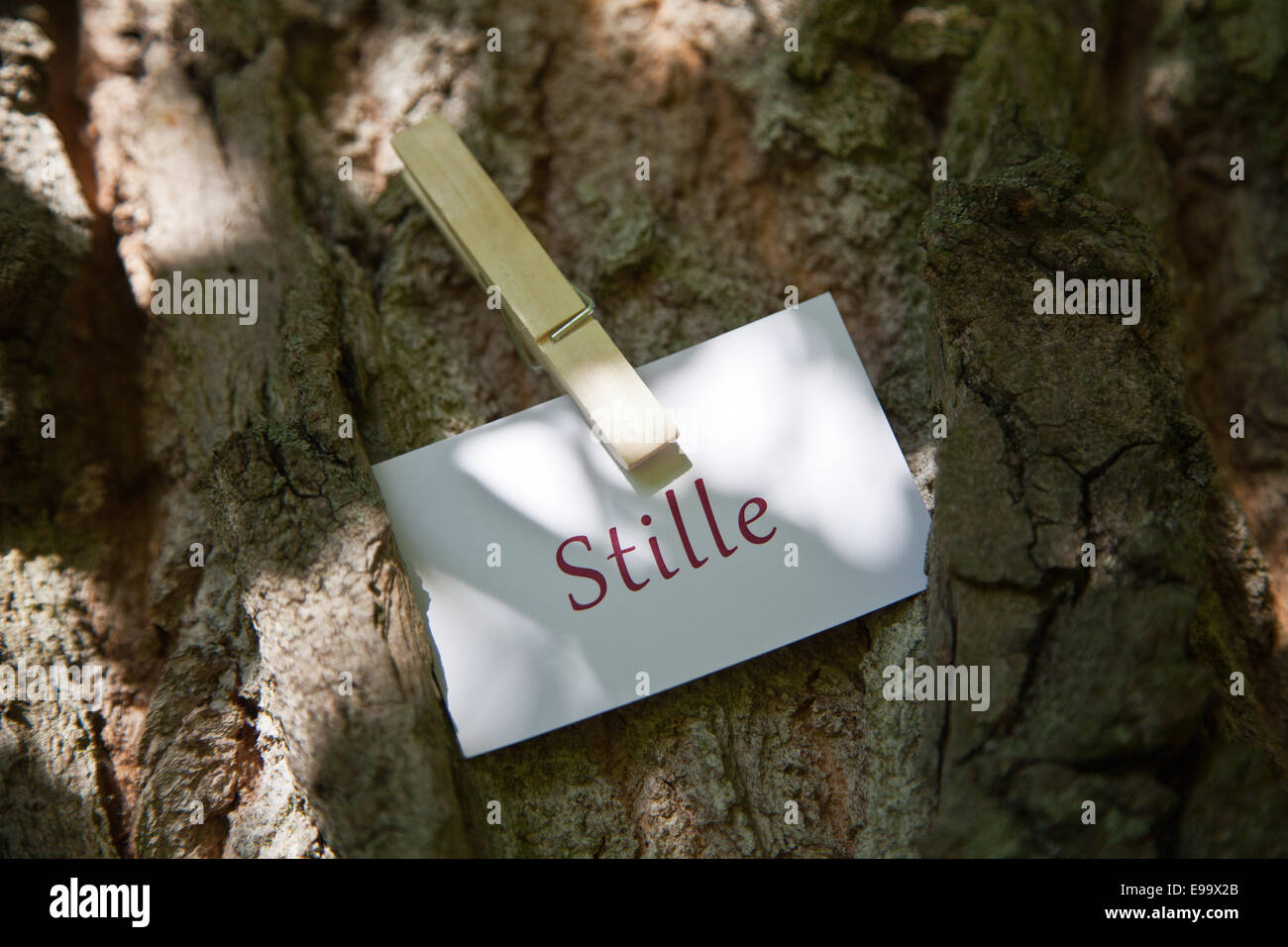 The word Stille on paper in nature Stock Photo - Alamy