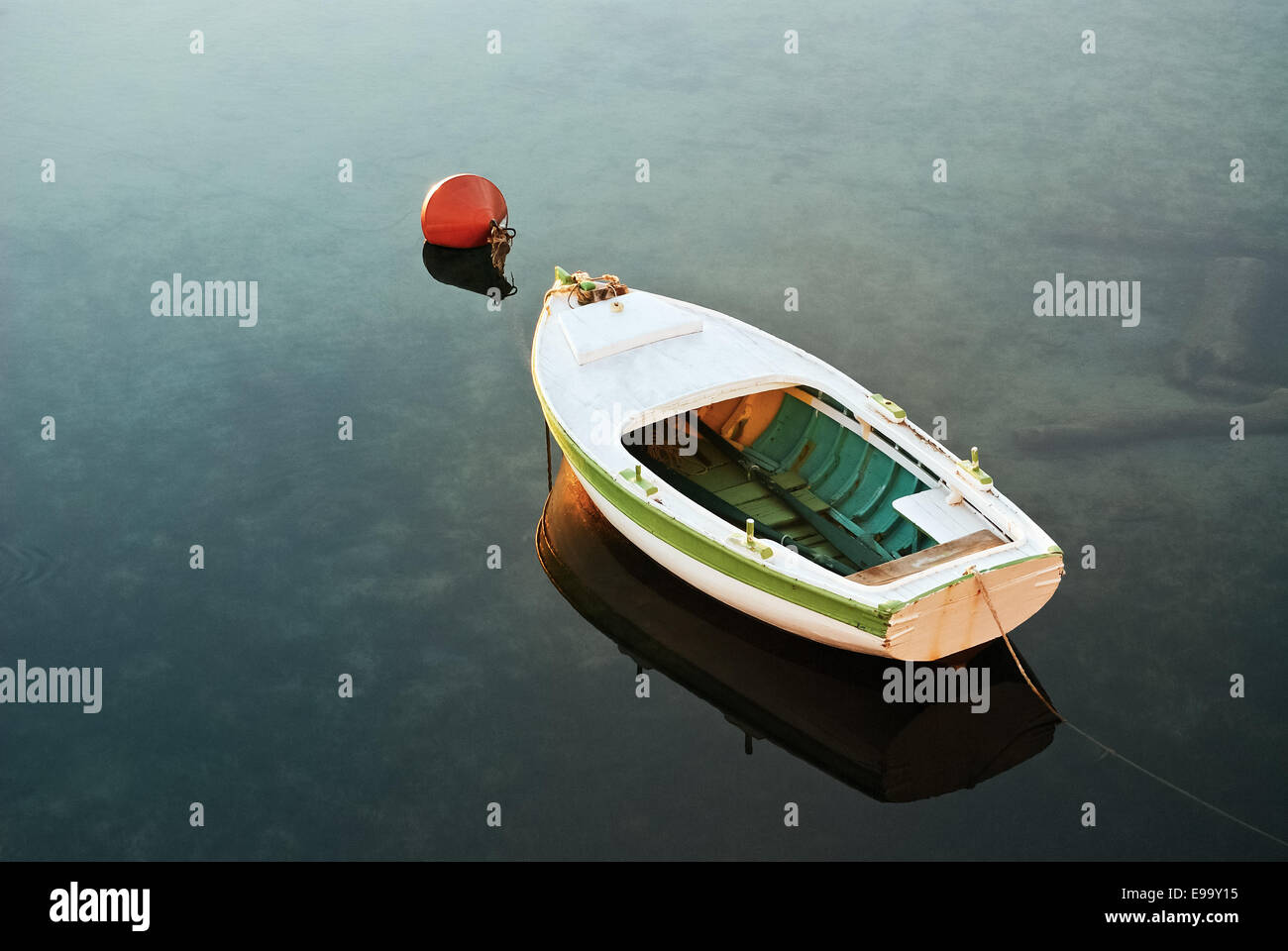Row boat at a buoy Stock Photo - Alamy