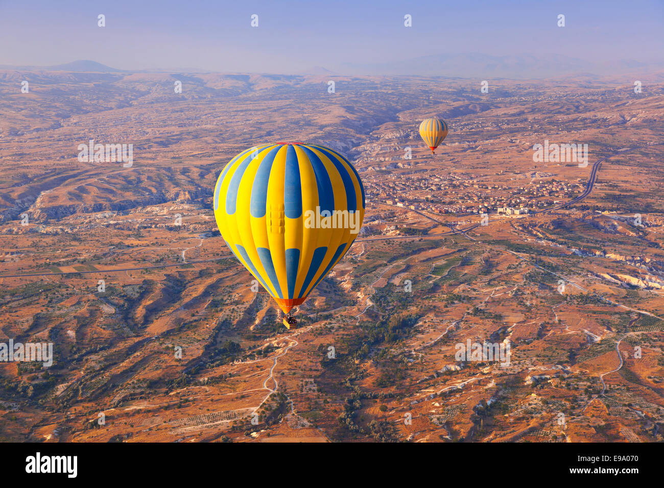 Hot air balloon flying over Cappadocia Turkey Stock Photo - Alamy