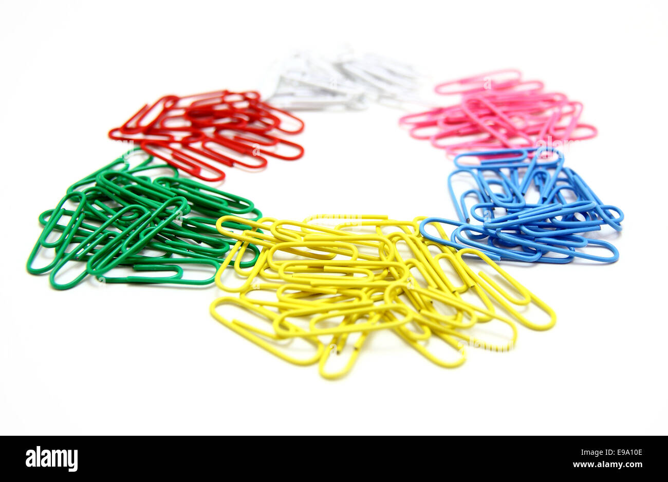 Color paper clips to background Stock Photo - Alamy