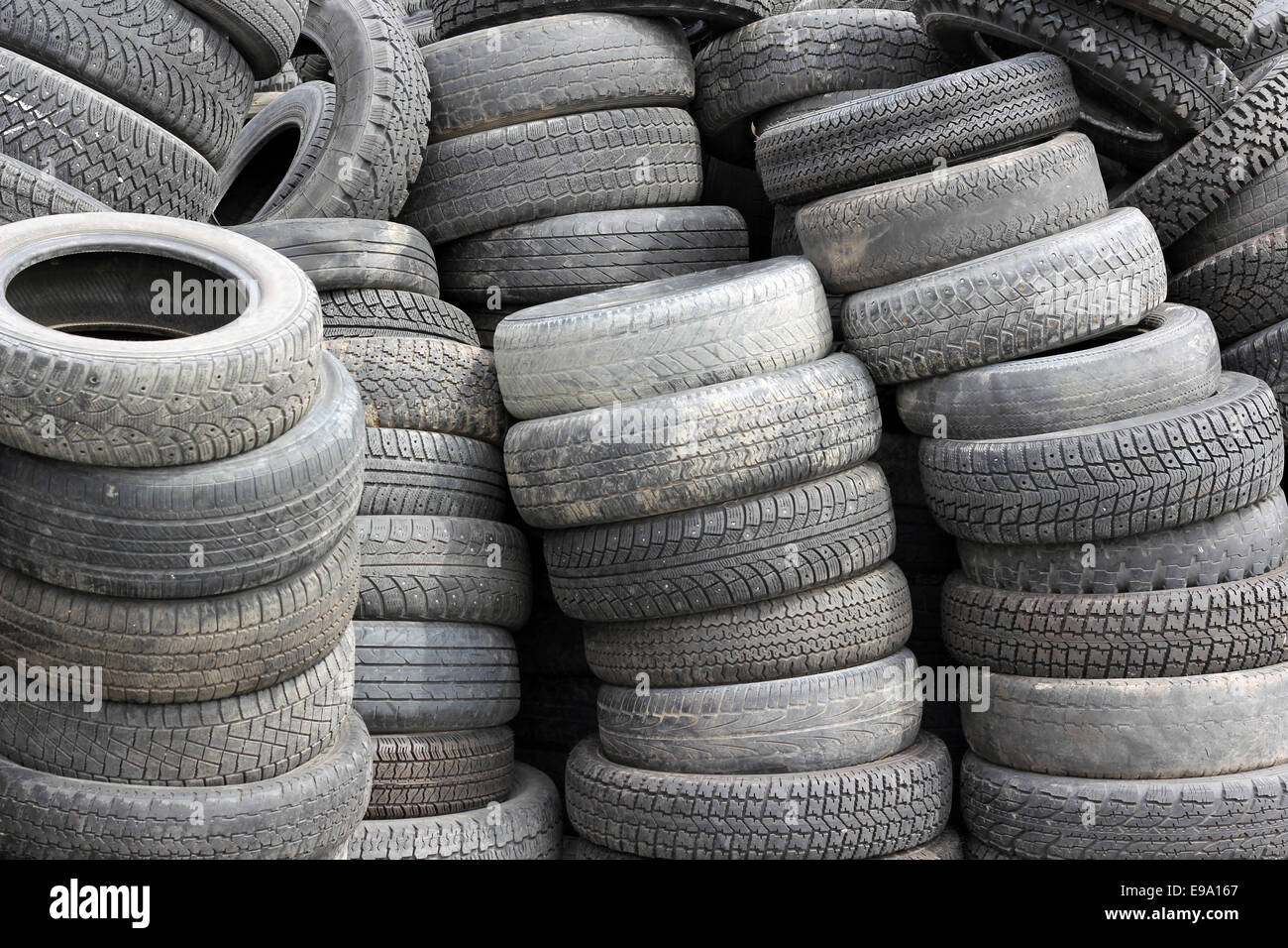 background with old tires on each other Stock Photo - Alamy