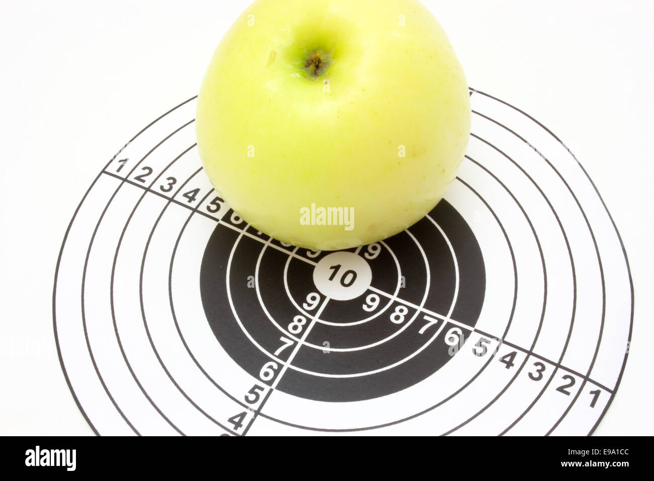 target and apple Stock Photo - Alamy