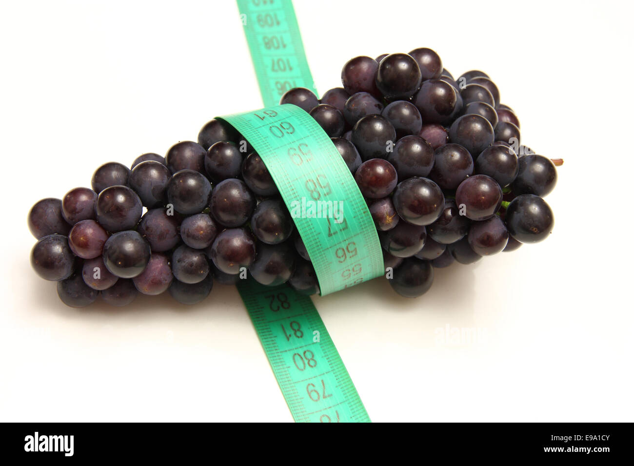 measuring tape around grapes Stock Photo - Alamy