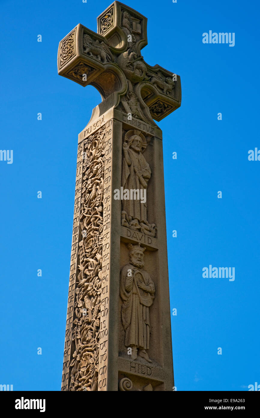 Close up of the Caedmon Cross and blue sky in summer St Marys ...