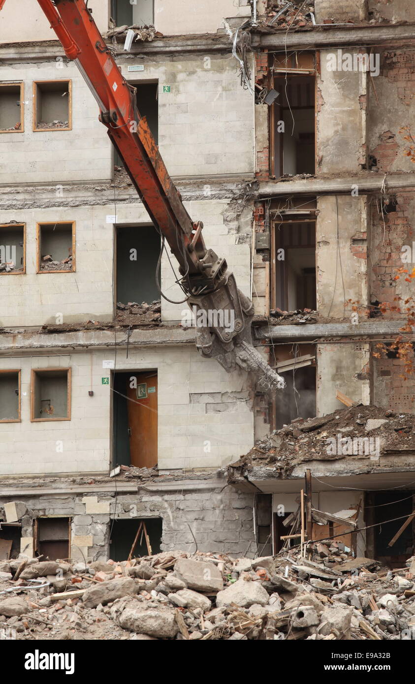 Excavator working demolition building hi-res stock photography and ...