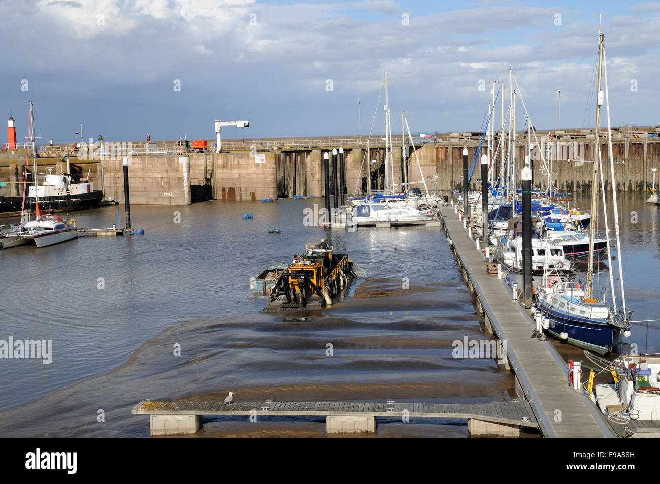 Dredging silt from the harbour at Watchet somerset England UK GB Stock ...