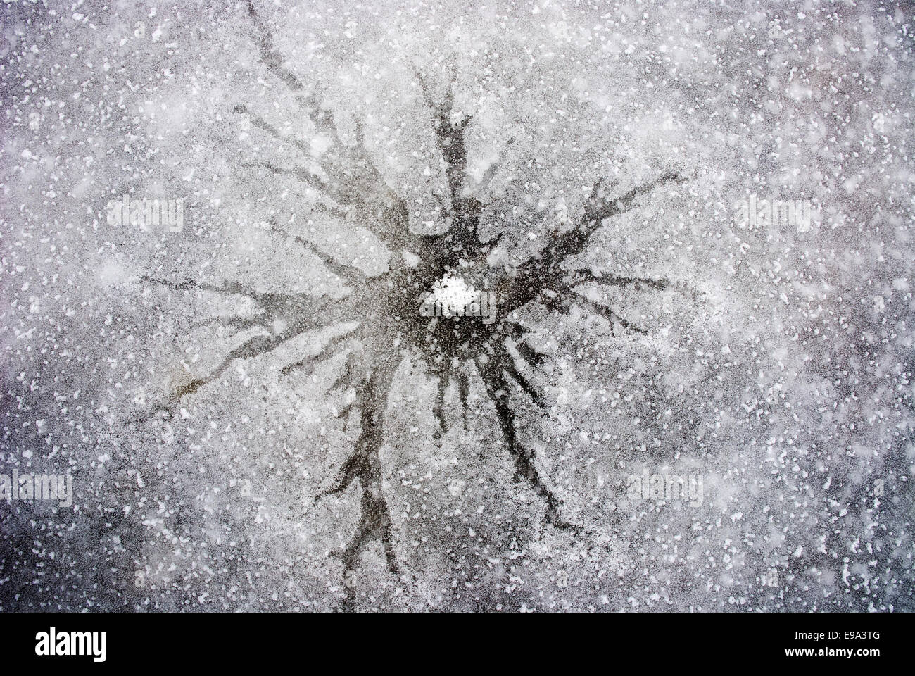 Cut in ice of a lake Stock Photo - Alamy