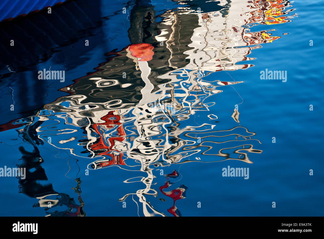 Reflection of a boat in the water Stock Photo - Alamy