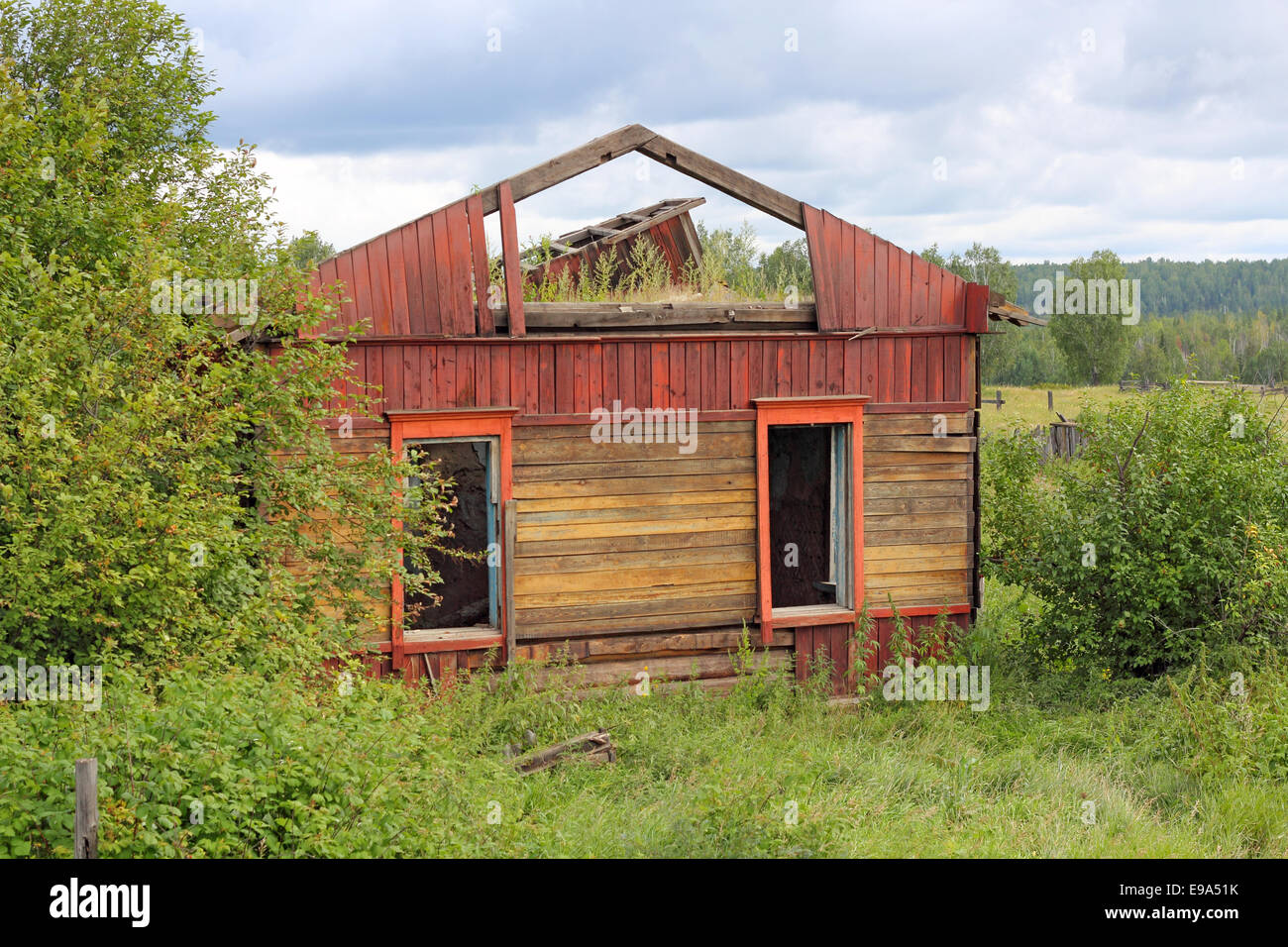 Old wooden house in village Stock Photo - Alamy