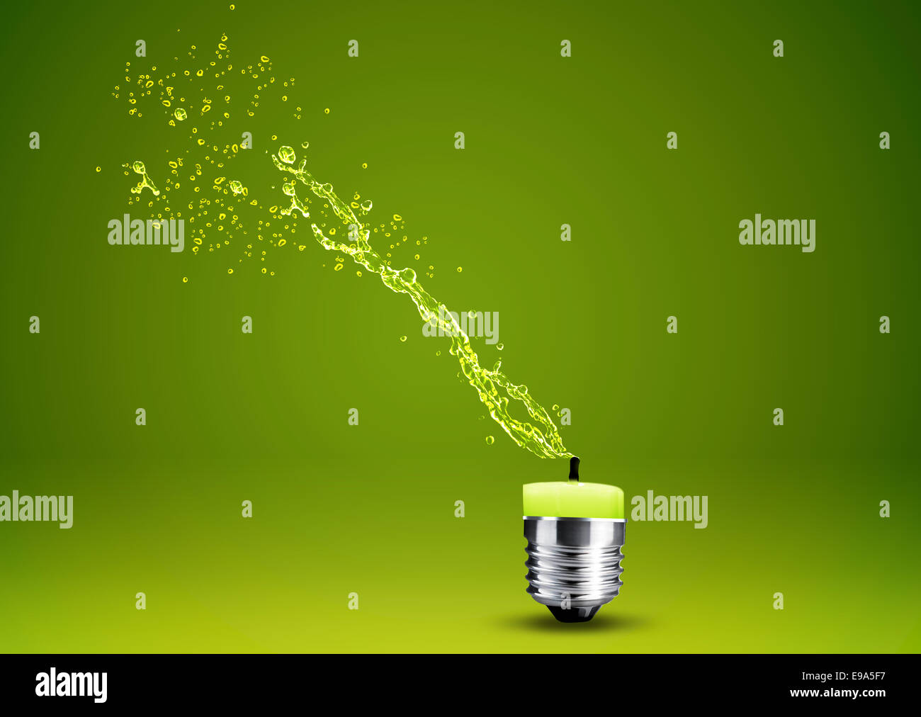 Wax candle into lighting bulb with water splashes Stock Photo - Alamy