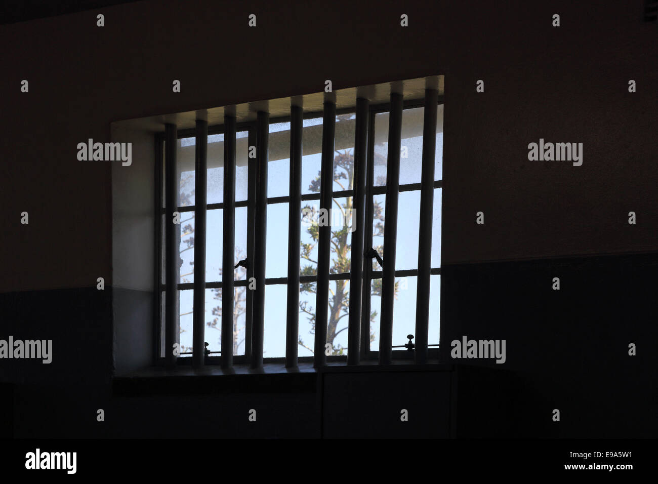 looking out a cell window at robben island off the coast of cape town ...