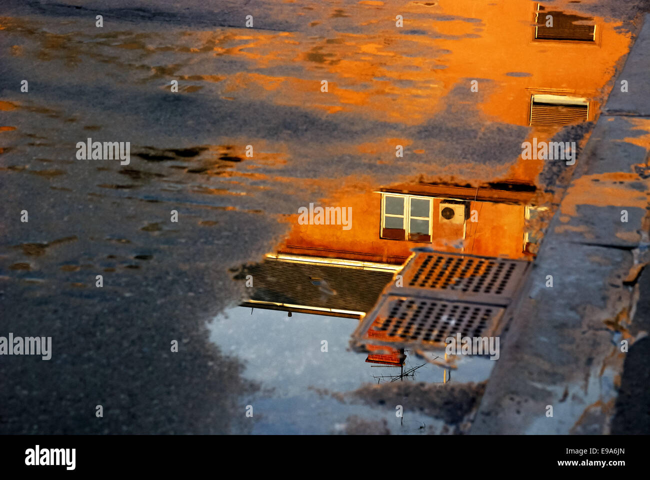Reflection at a puddle Stock Photo - Alamy