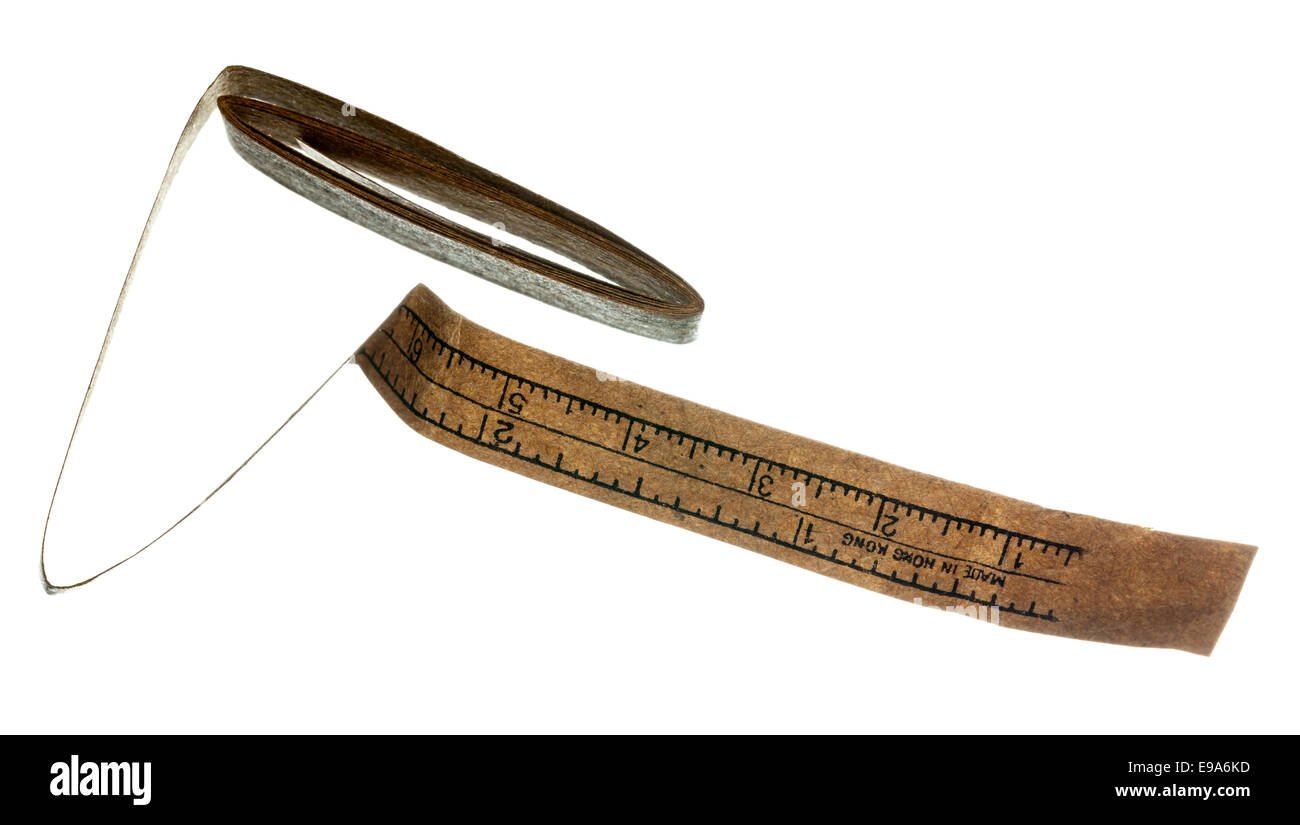Cheap paper measuring tape Stock Photo - Alamy