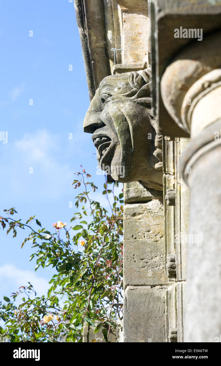 Old gargoyle with ugly open mouth Stock Photo - Alamy