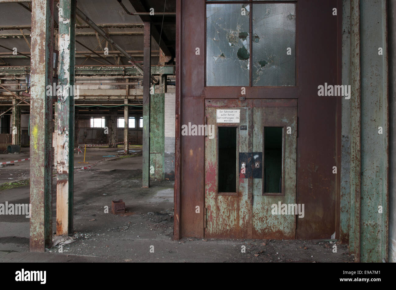 Factory floor with elevator Stock Photo - Alamy