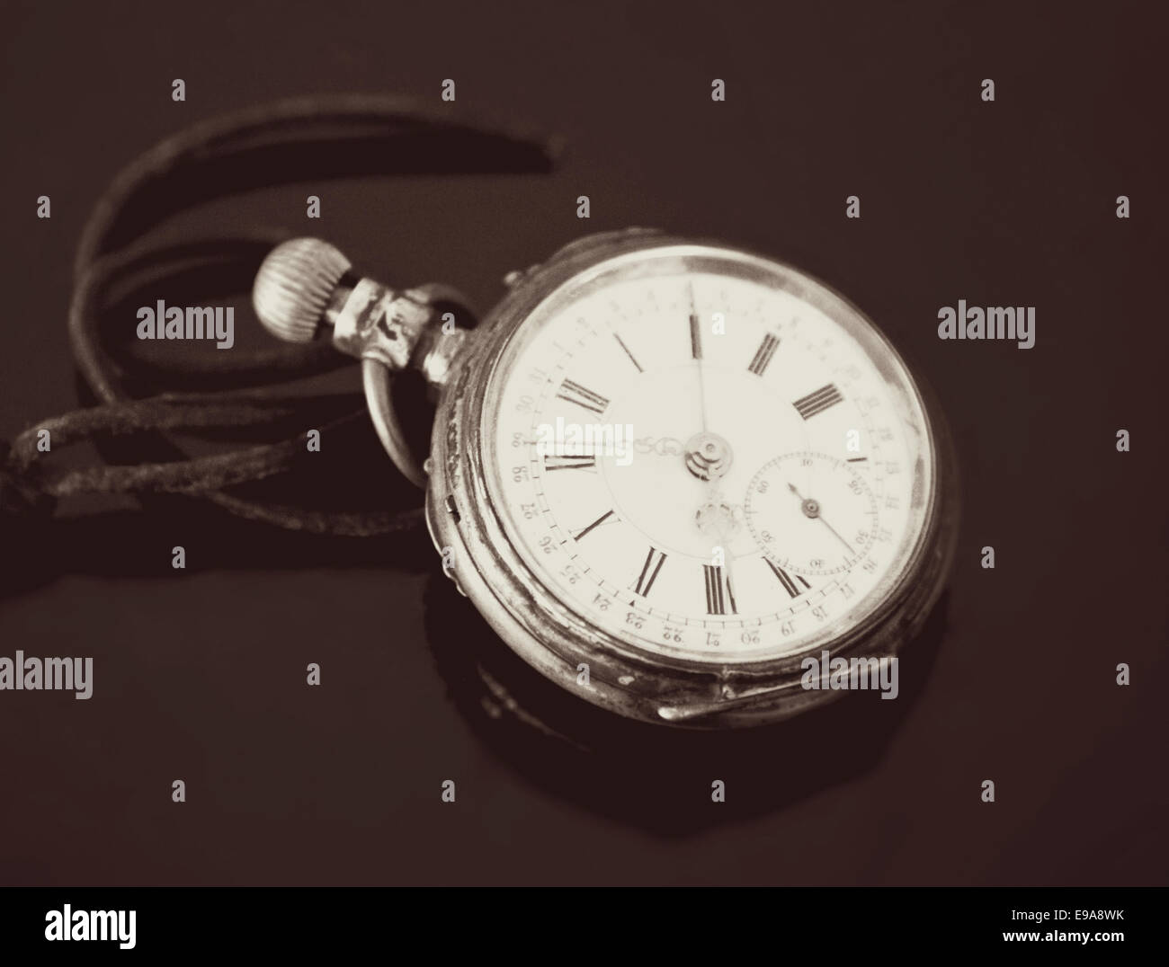 Pocket clock in gold Stock Photo - Alamy