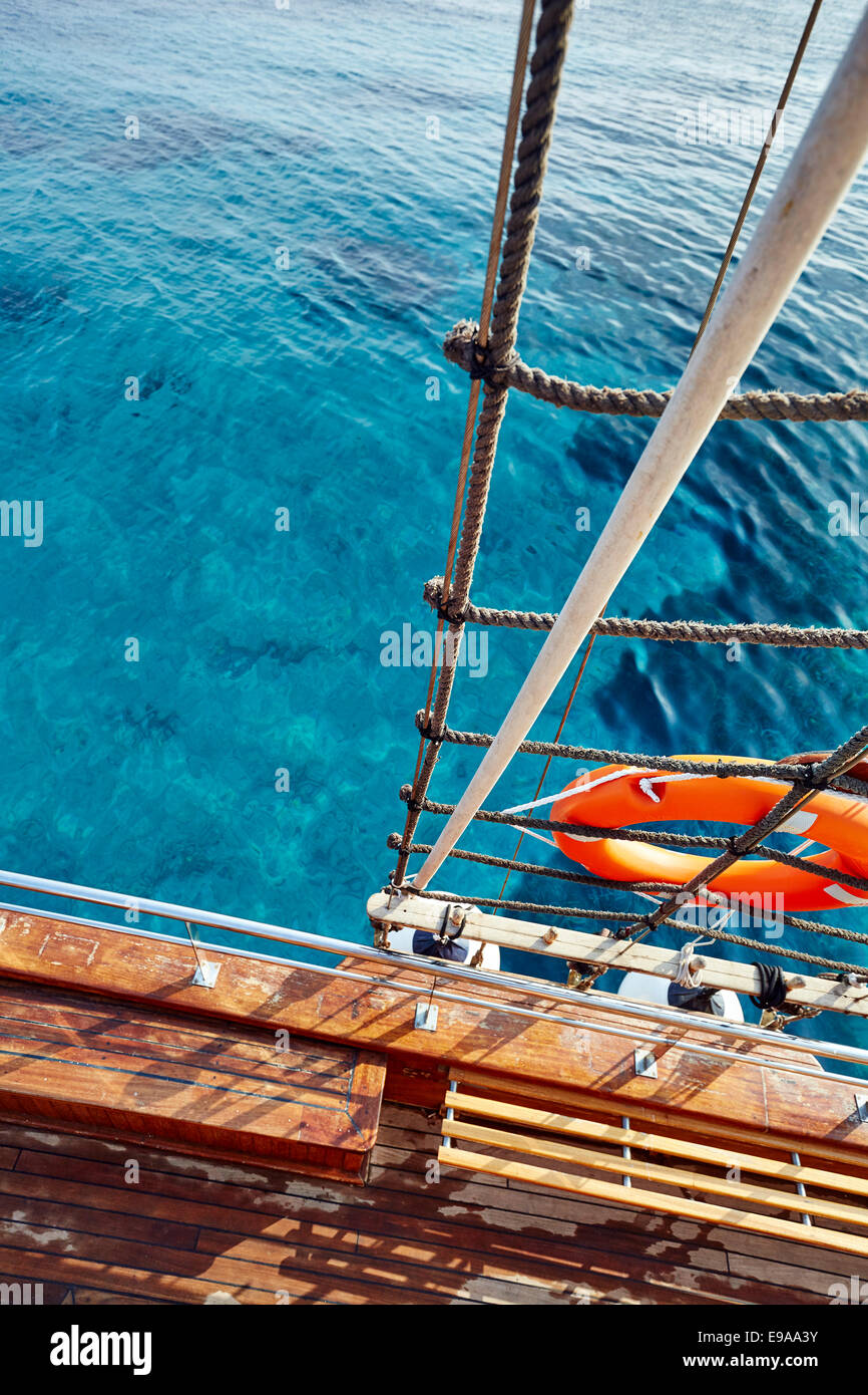 Ships rigging with clear blue sea Stock Photo - Alamy