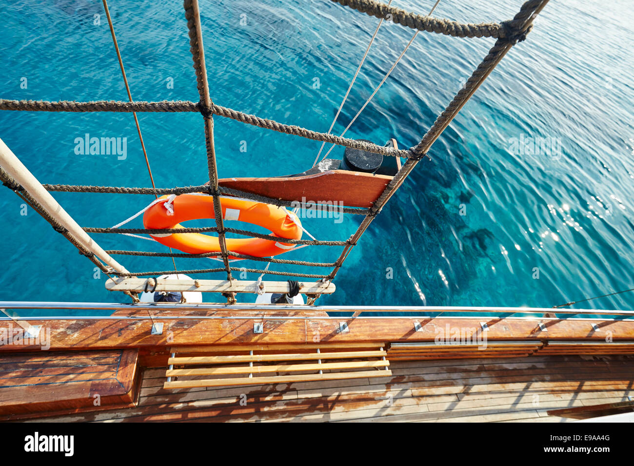 Ships rigging with clear blue sea Stock Photo - Alamy