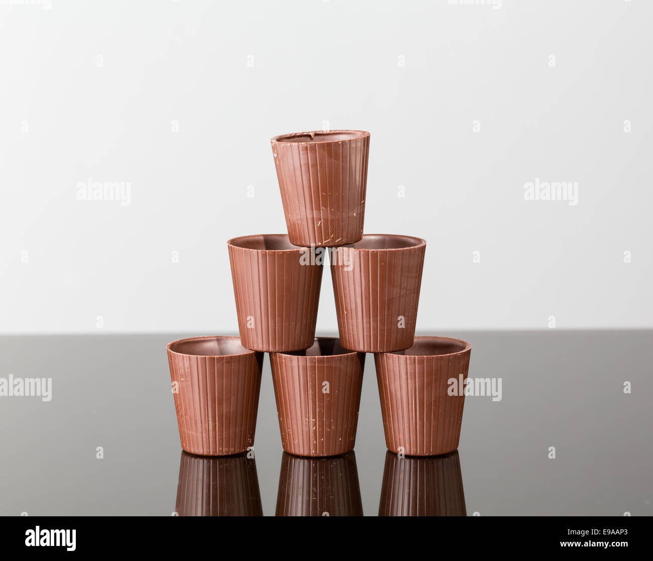 Stack of chocolate cups Stock Photo - Alamy
