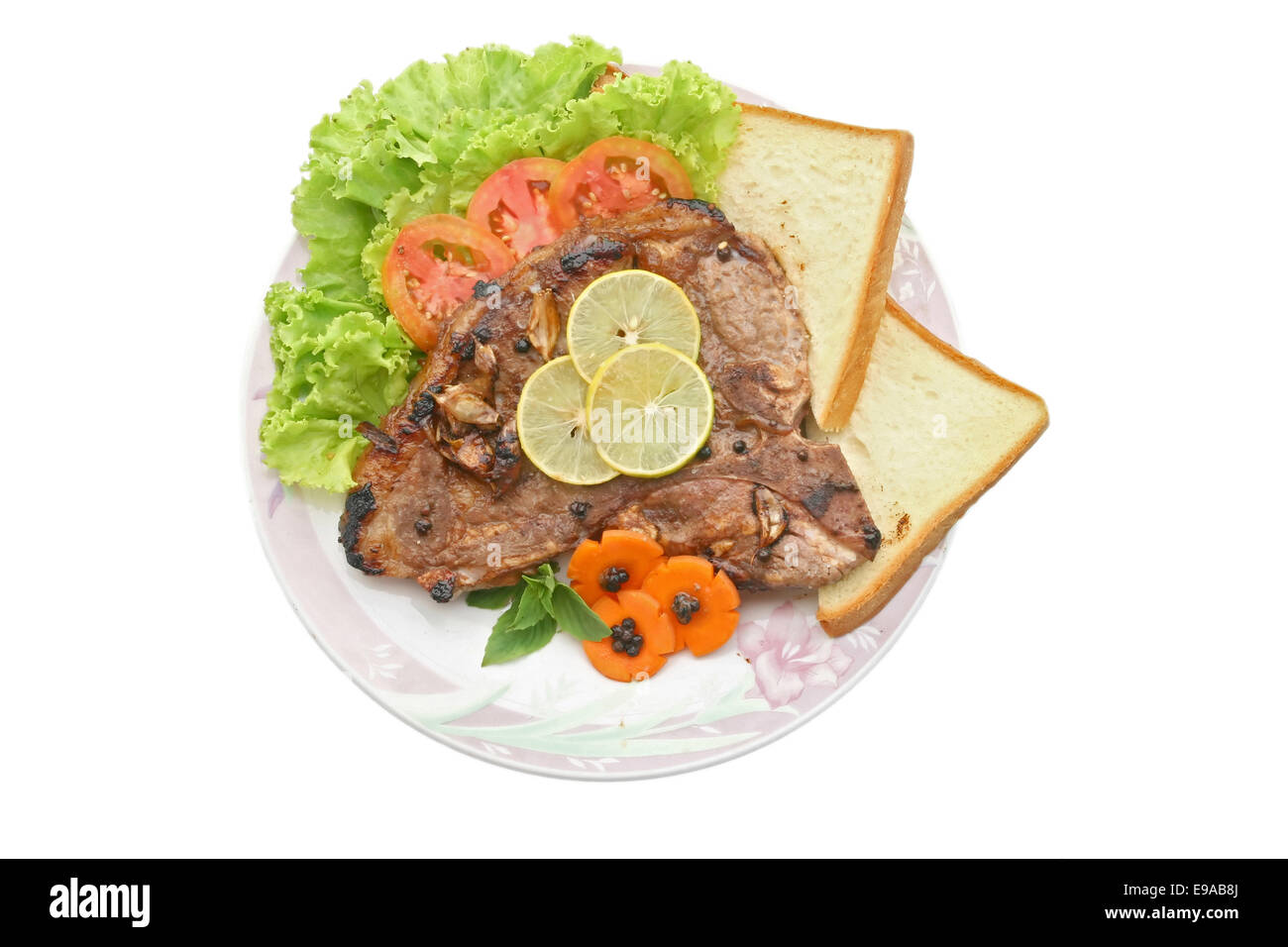 Grilled bone steak sliced Cut Out Stock Images & Pictures - Alamy